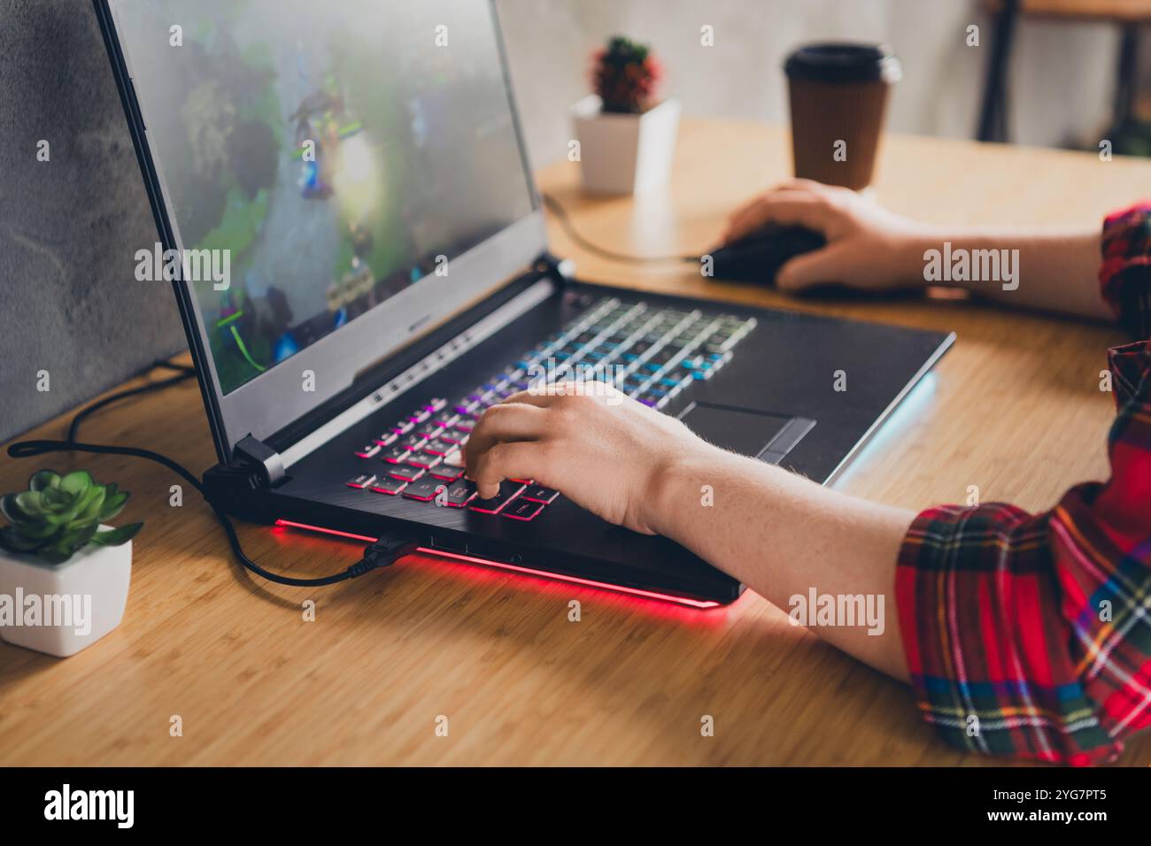 Person using a colorful laptop with a wireless mouse Stock Photo - Alamy