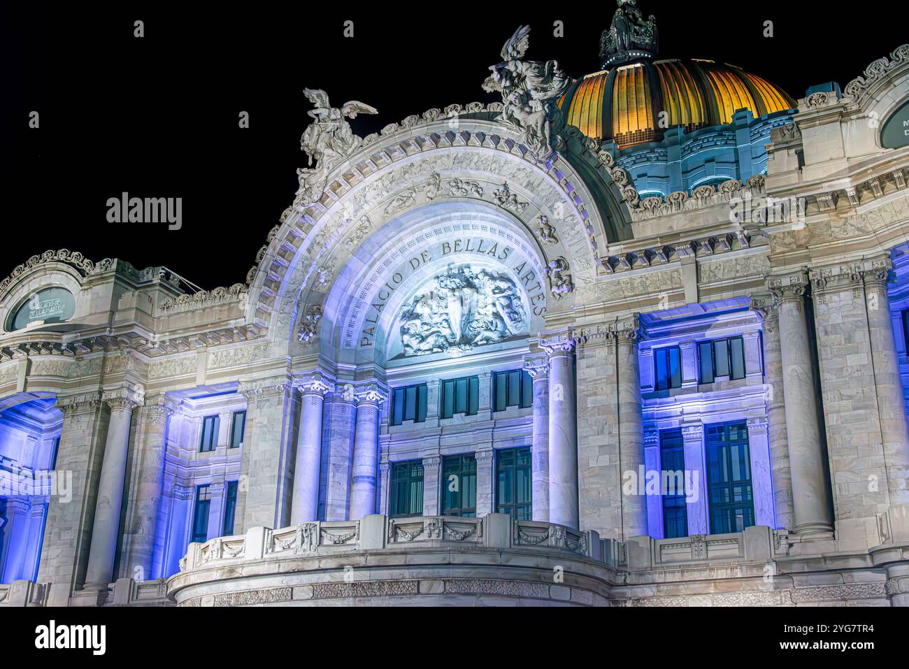 A mesmerizing nighttime view of the Palacio de Bellas Artes in Mexico ...