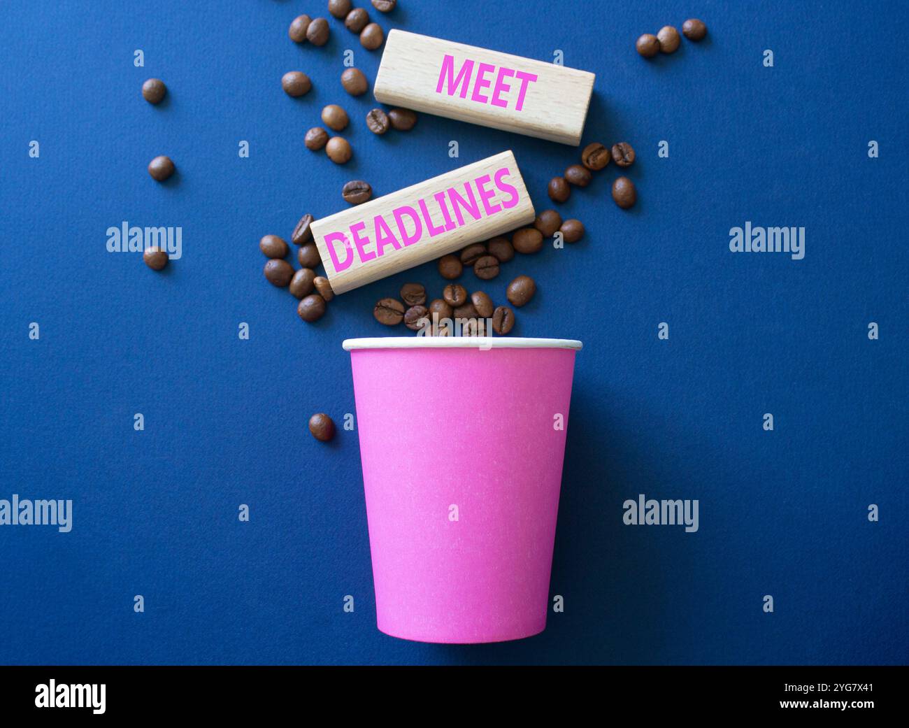 Meet Deadlines symbol. Concept word Meet Deadlines on wooden blocks ...