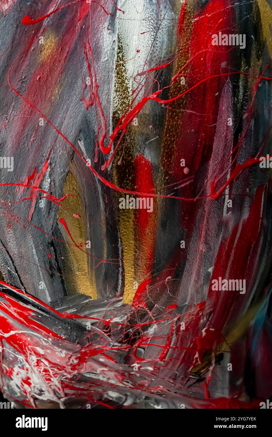 A model poses gracefully, her body adorned in vibrant body paint, with ...