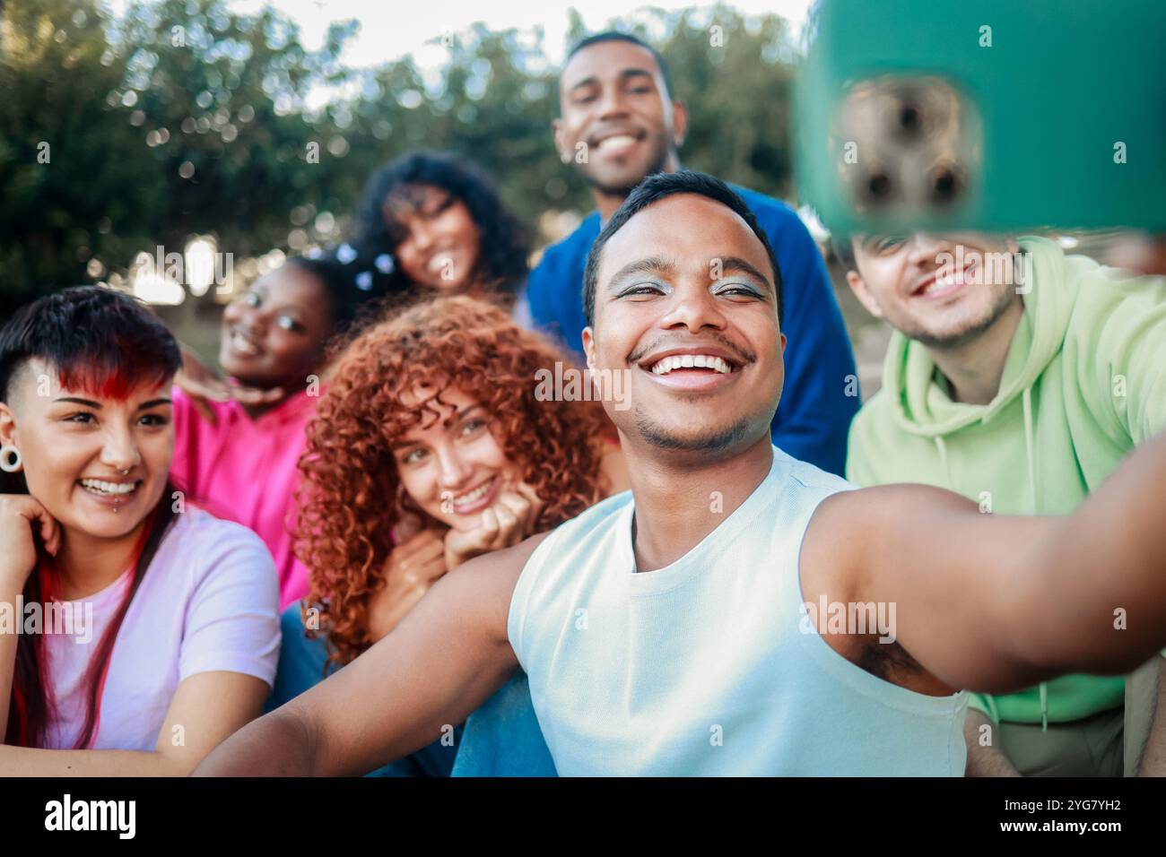 Diverse group of people having fun together, Transgender person having ...