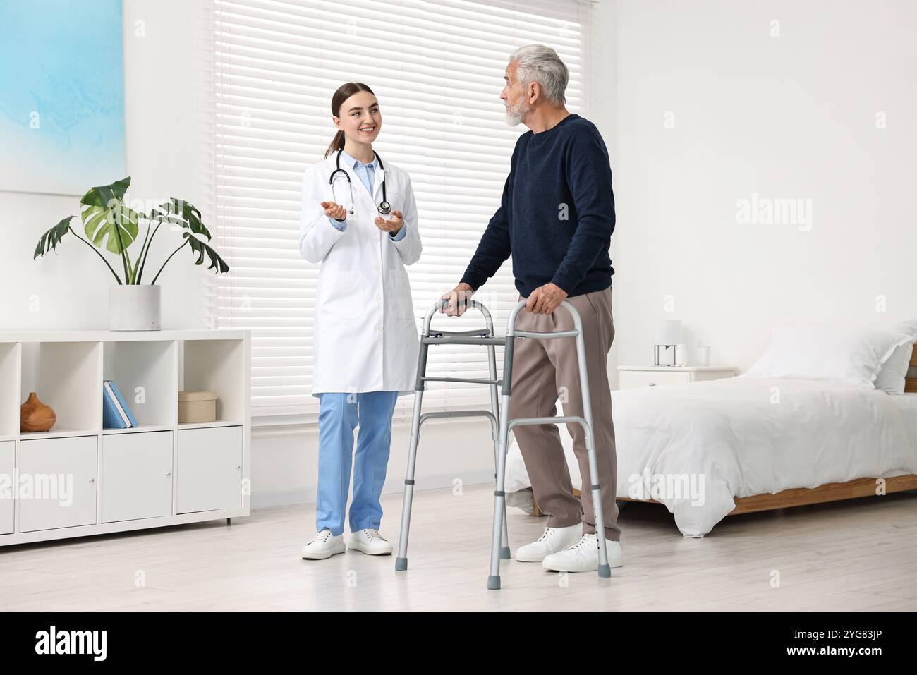Young patient walking to ward hi-res stock photography and images - Alamy