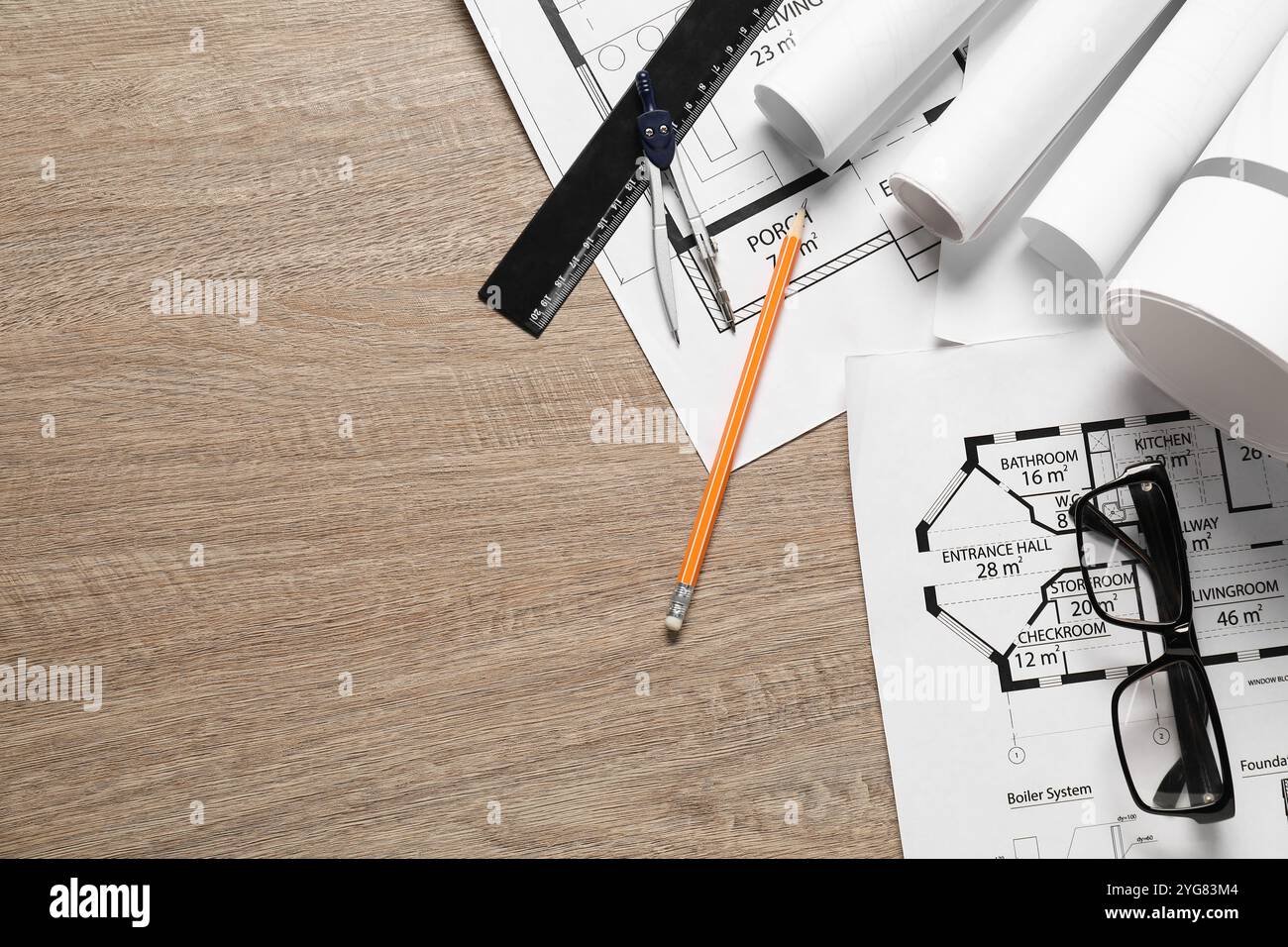 Different engineering drawings, glasses, ruler, pencil and dividers on ...