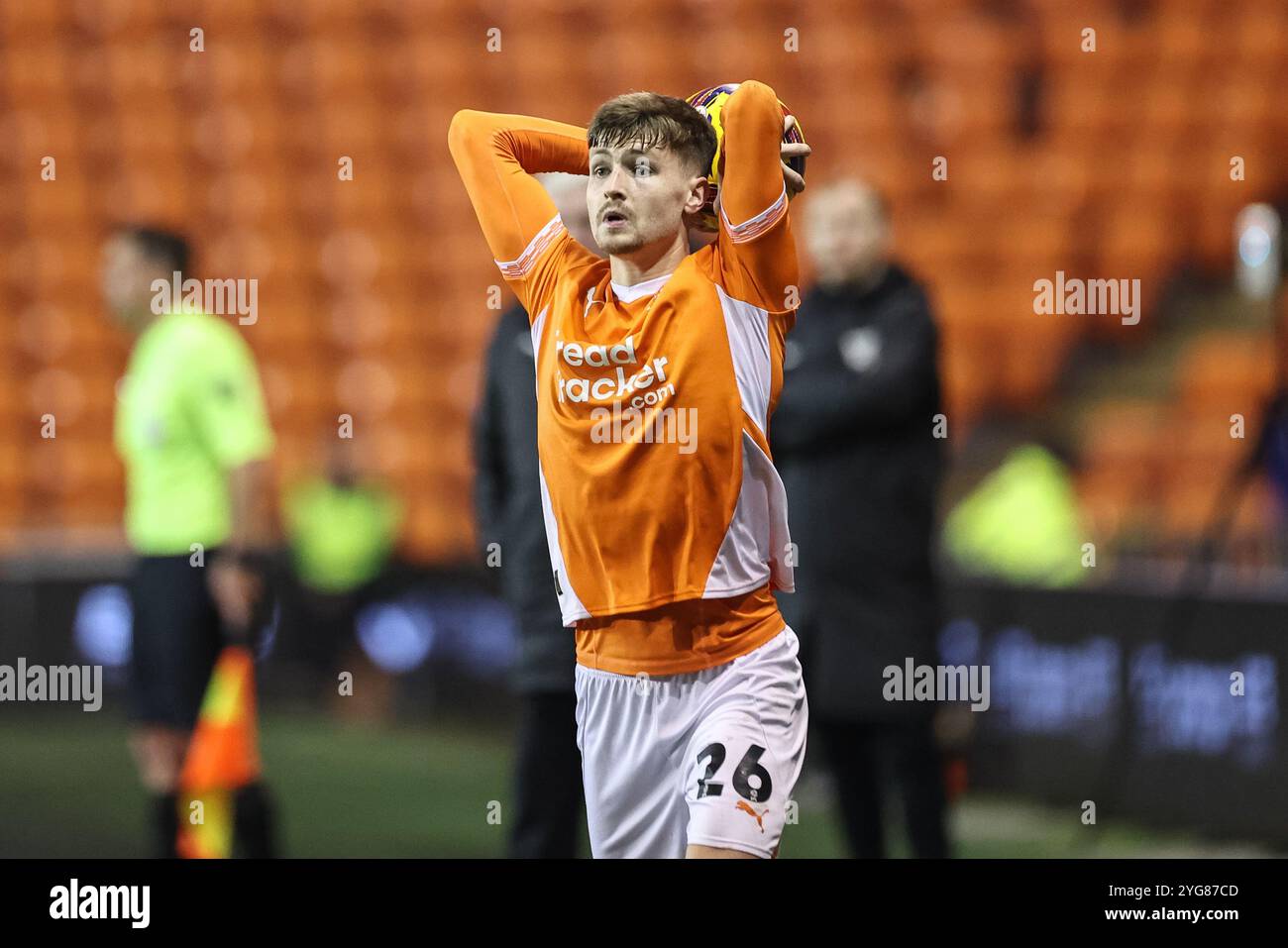 Zac Ashworth of Blackpool takes a throw-in during the Bristol Street ...