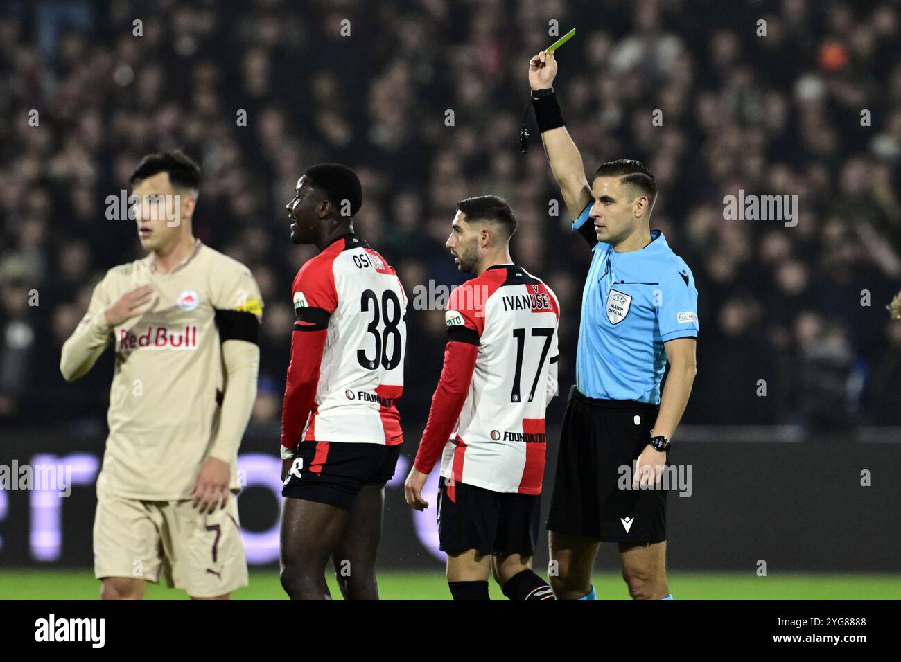 ROTTERDAM - (l-r) Referee Donatas Rumsas gives Ibrahim Osman of ...