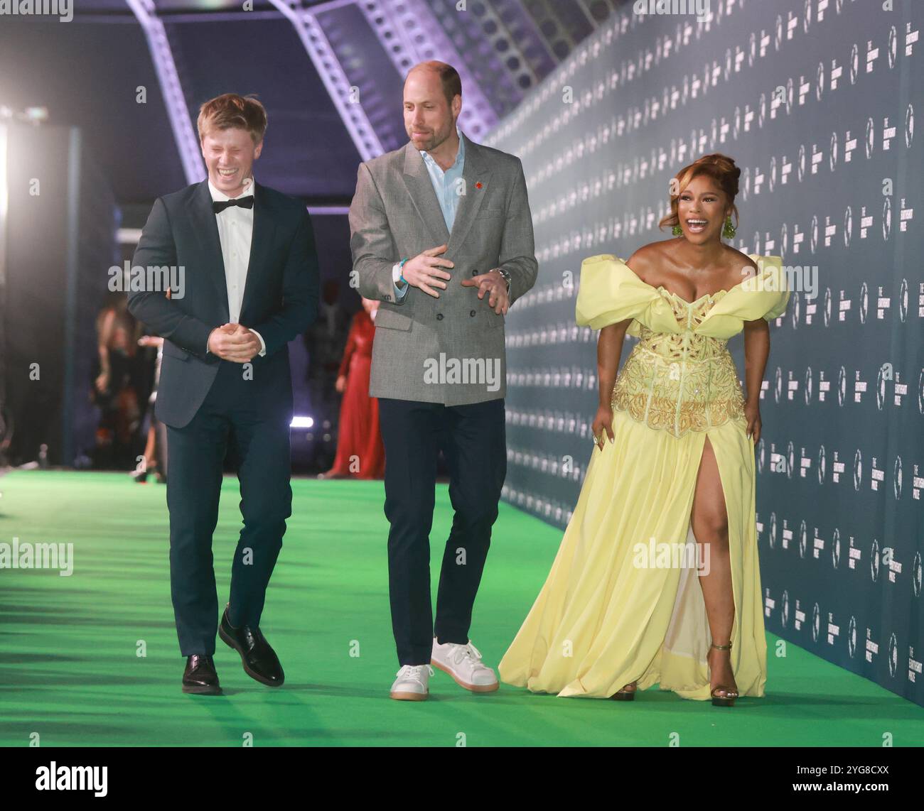 The Prince of Wales walks with Earthshot ambassadors Nomzamo Mbatha and ...