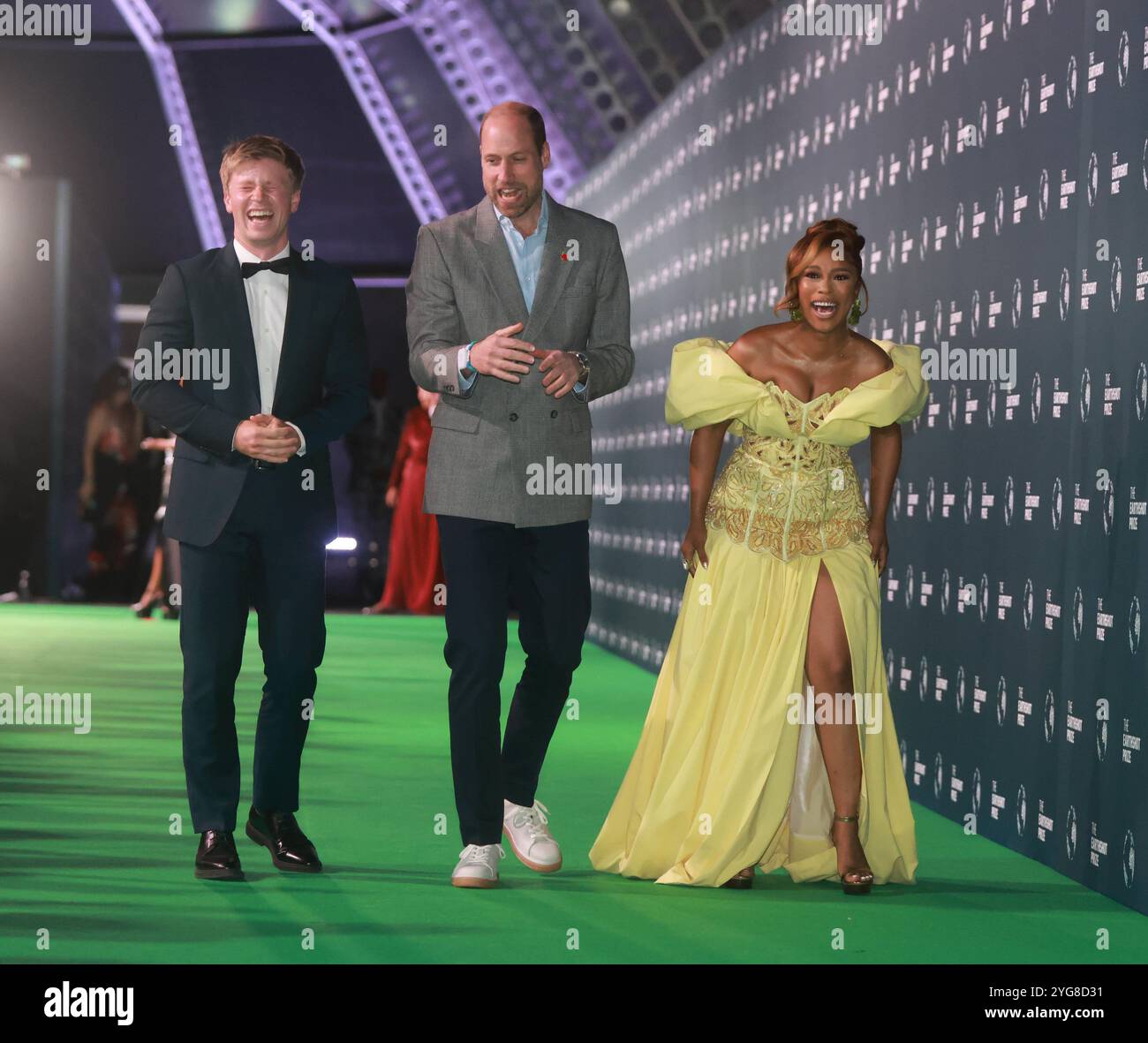 The Prince of Wales walks with Earthshot ambassadors Nomzamo Mbatha and ...