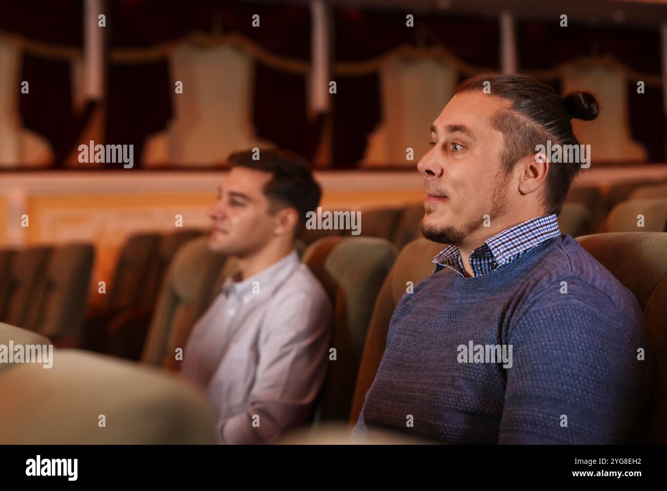 Two men watching stage hi-res stock photography and images - Alamy