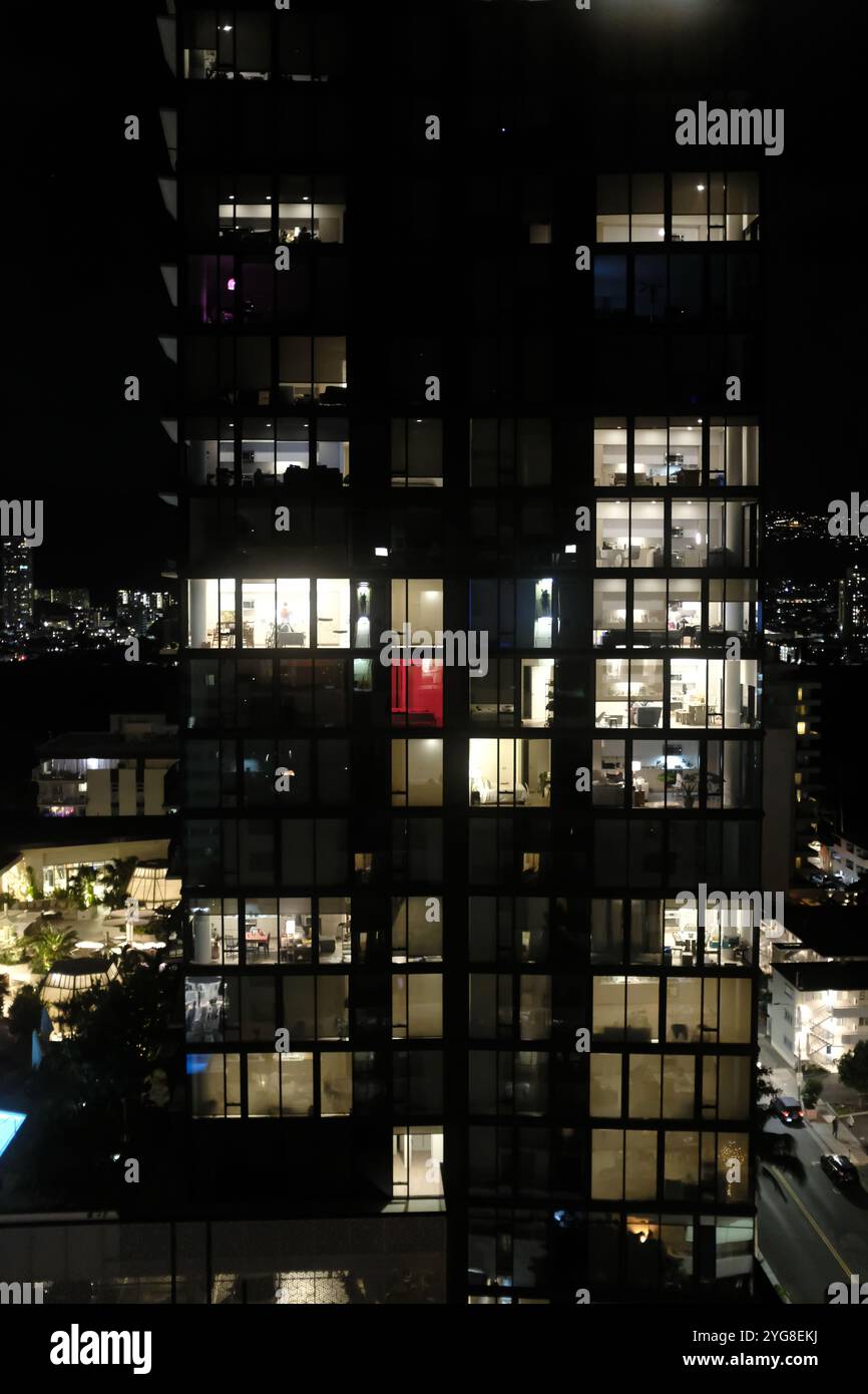 High-rise apartment at night Stock Photo - Alamy