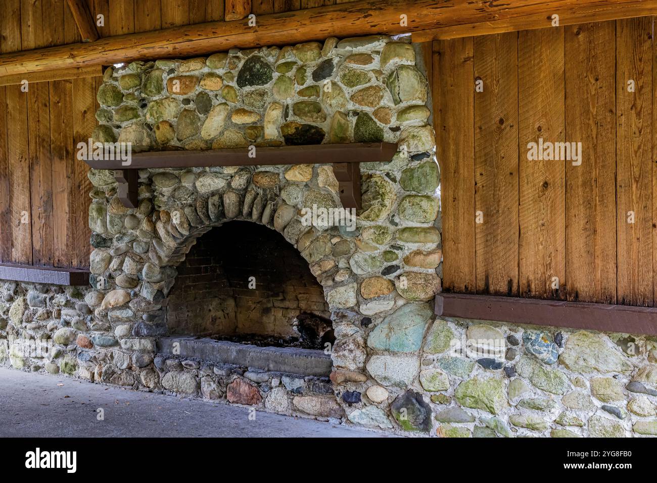 Rustic picnic shelter with river rock fireplace built in the 1950s in ...