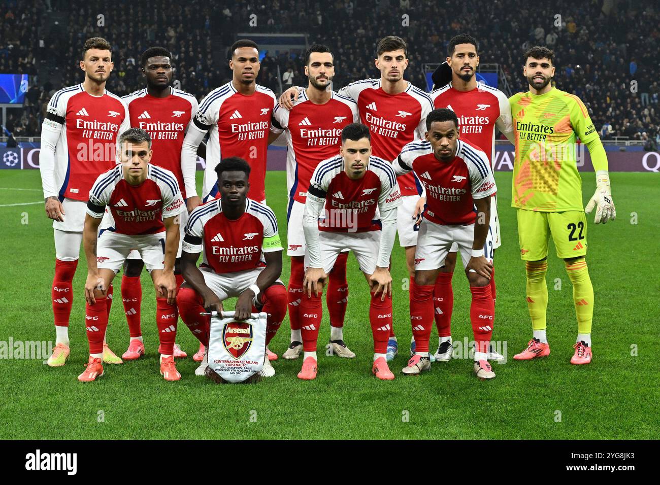 Arsenal F.C. players are posing for a team photo during the UEFA ...