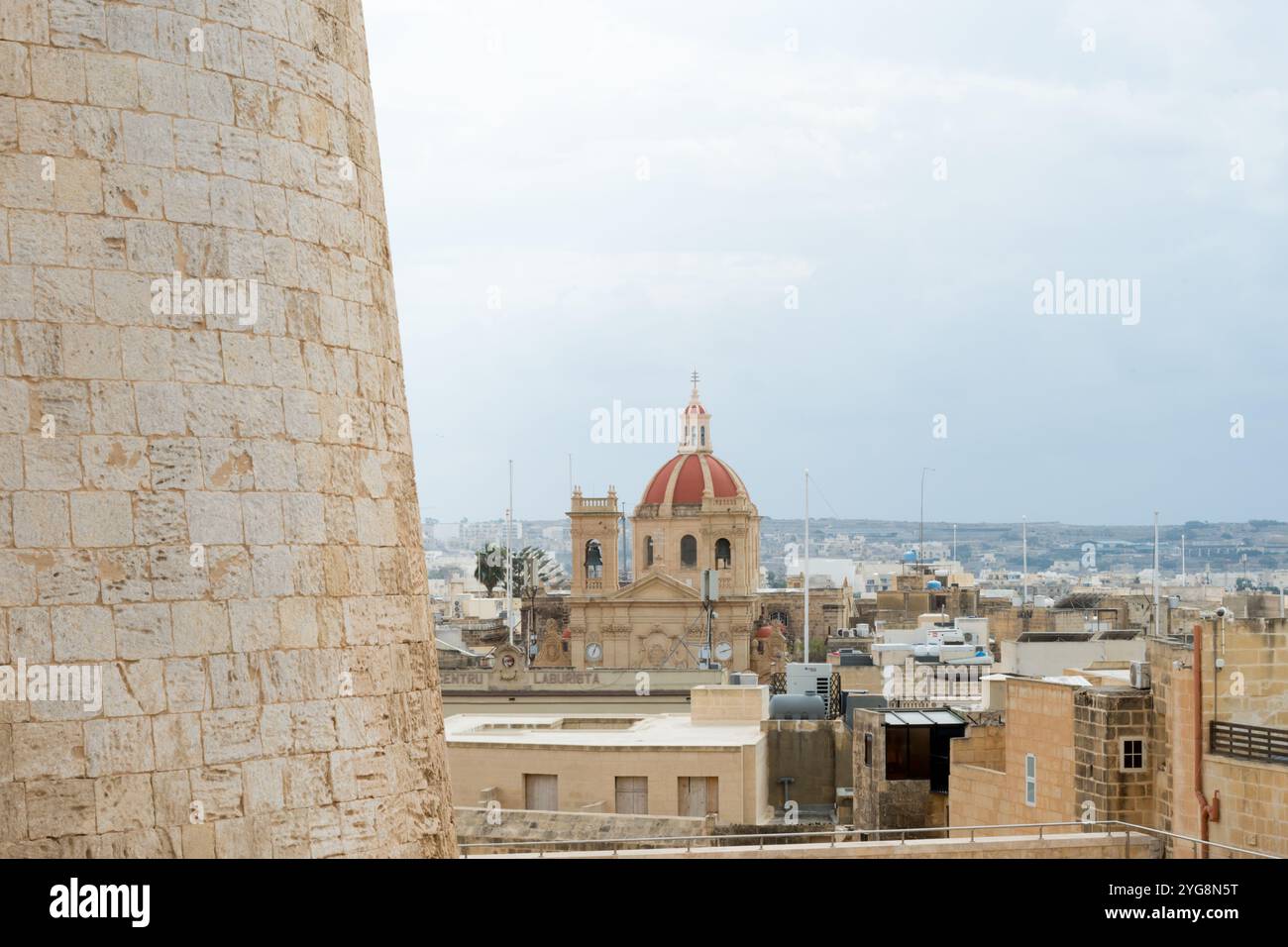 Aerial view of Victoria, Gozo from the citadel. St. Georges Basilica ...