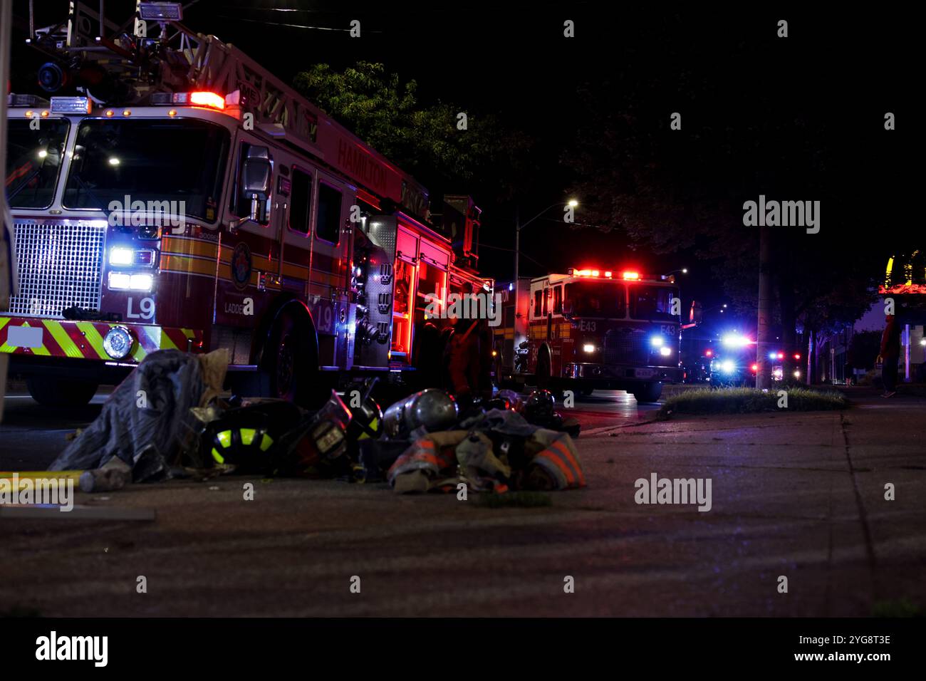 Firetrucks and firefighter equipment with flashing lights Stock Photo ...
