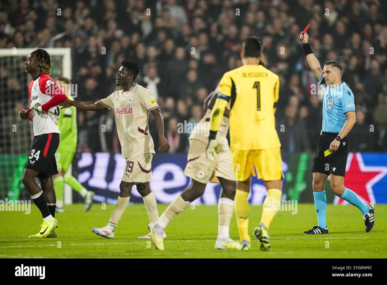 Rotterdam - Chris-Kevin Nadje of Feyenoord, Referee Donatas Rumsas ...