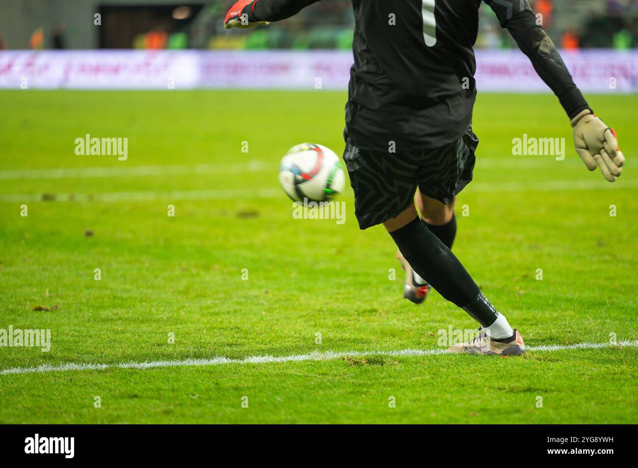 Goalkeeper kicks ball from 5 meters line during soccer match Stock ...