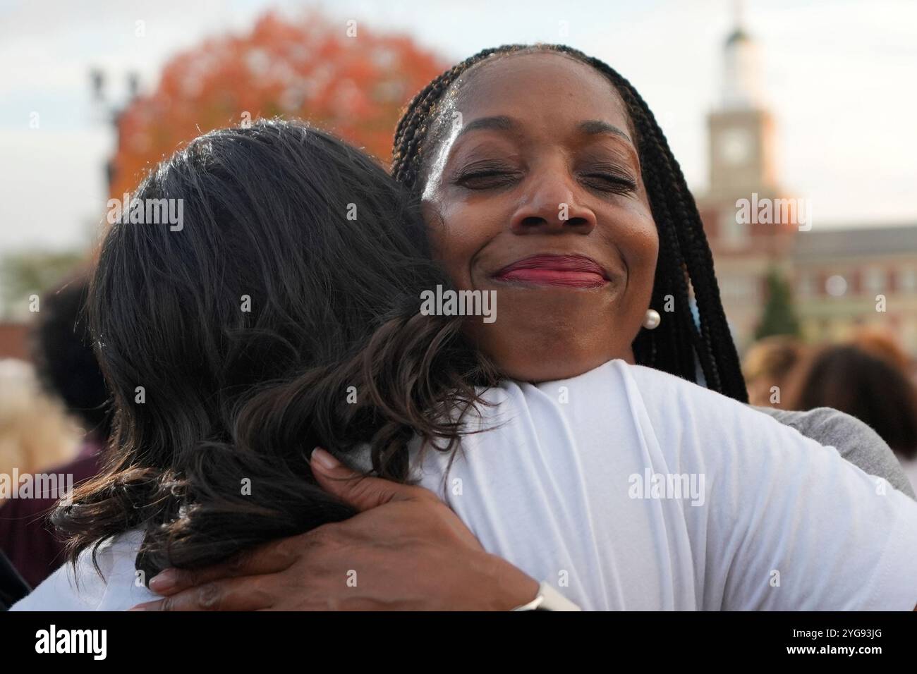 Supporters of Vice President Kamala Harris embrace at her concession ...