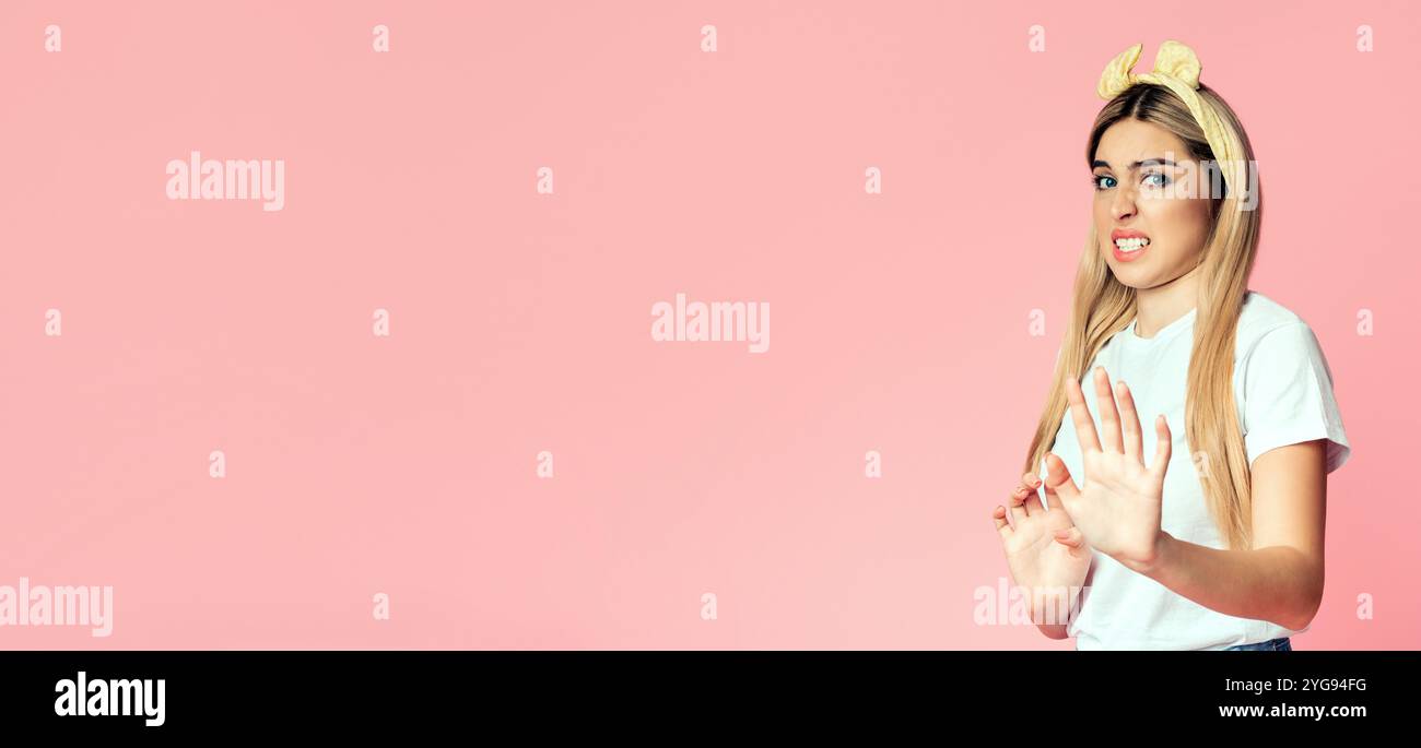 Shocked teen girl with disgusted face at studio Stock Photo - Alamy