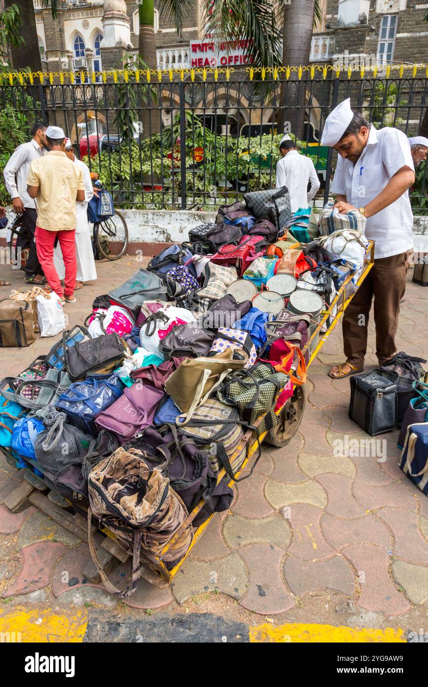 India, Mumbai. Street Scene at lunch time. Dabbawallahs (delivery ...