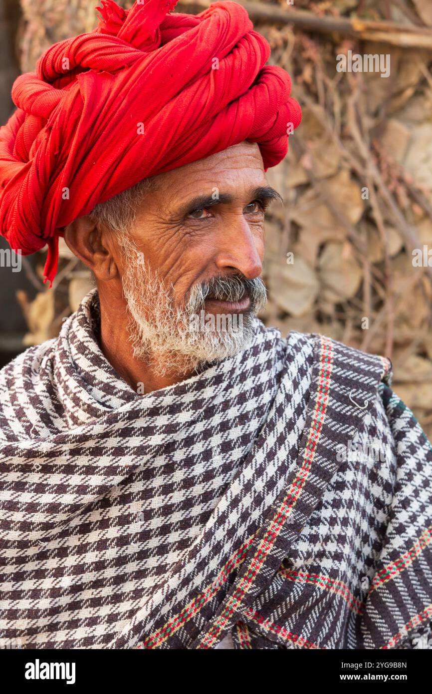 India, Delhi, Udaipur, Bera. Tribes people. Man in red turban Stock ...