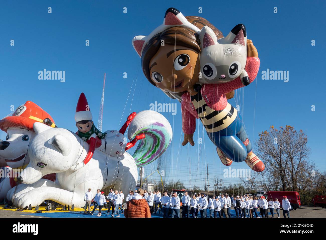 Handlers fly a new balloon of Gabby and Pandy Paws from the show Gabby ...
