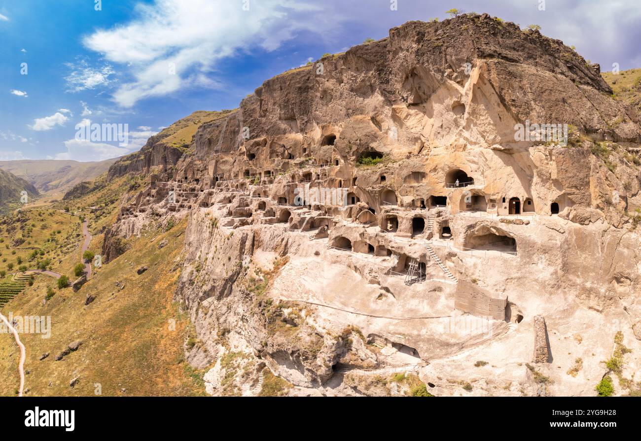 Aerial top view of Vardzia city on sunny summer day. Ancient cave ...