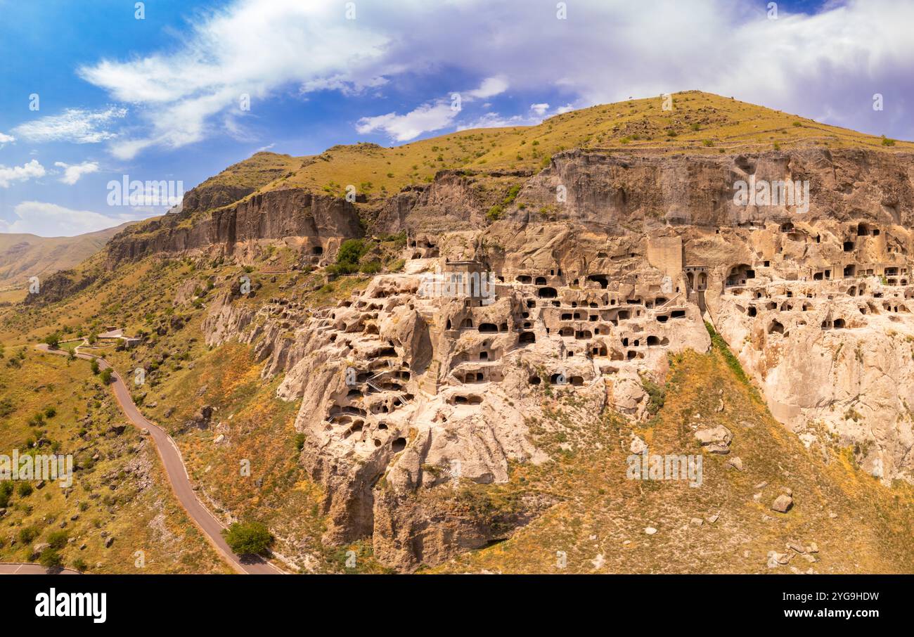 Aerial top view of Vardzia city on sunny summer day. Ancient cave ...