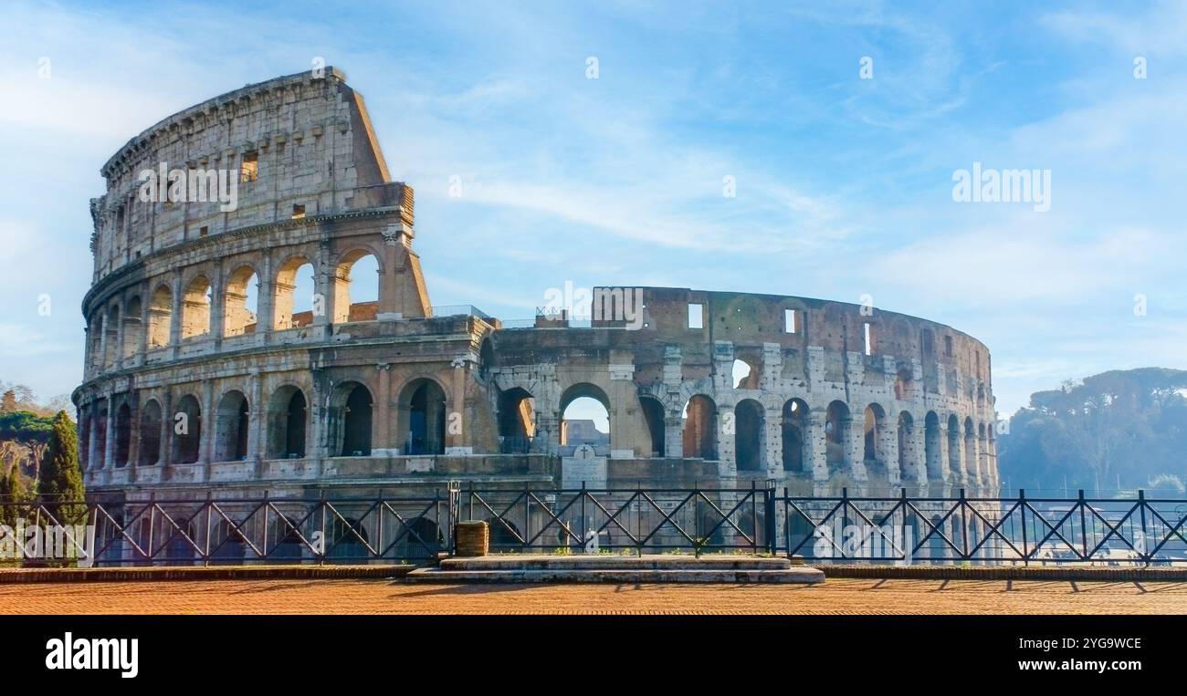The great ancient Colosseo, the symbol of Rome, view from Roman Forum ...