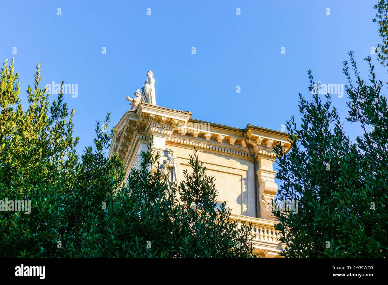 Santa Francesca Romana Basilica through the lush greenery, Roman Forum ...