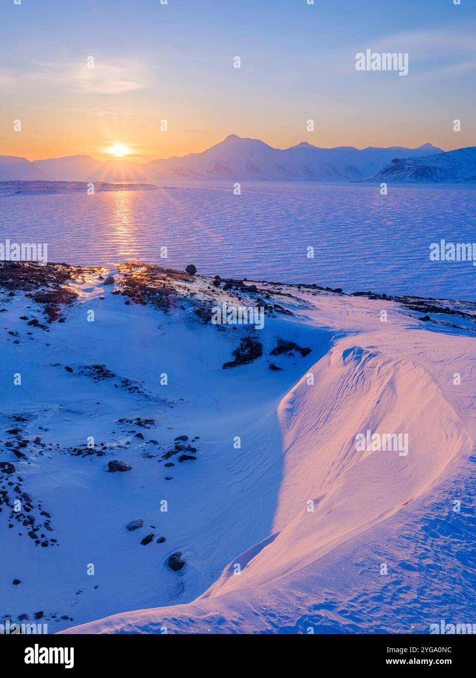 View over frozen Adolfbukta and Billefjorden towards Pyramiden ghost ...