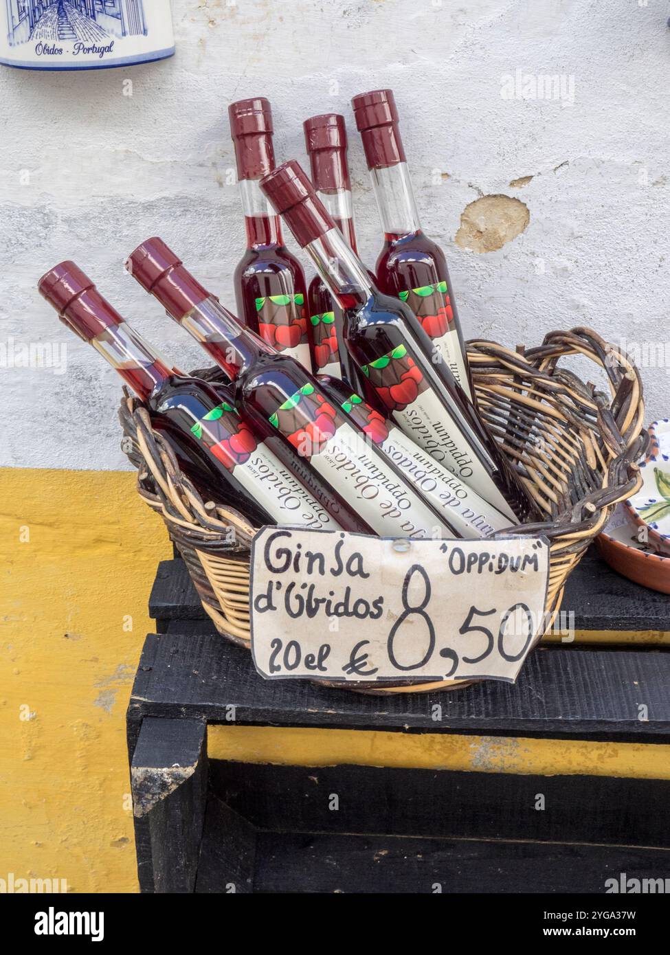 Portugal, Obidos. A basket of Ginja de Obidos - a traditional local ...