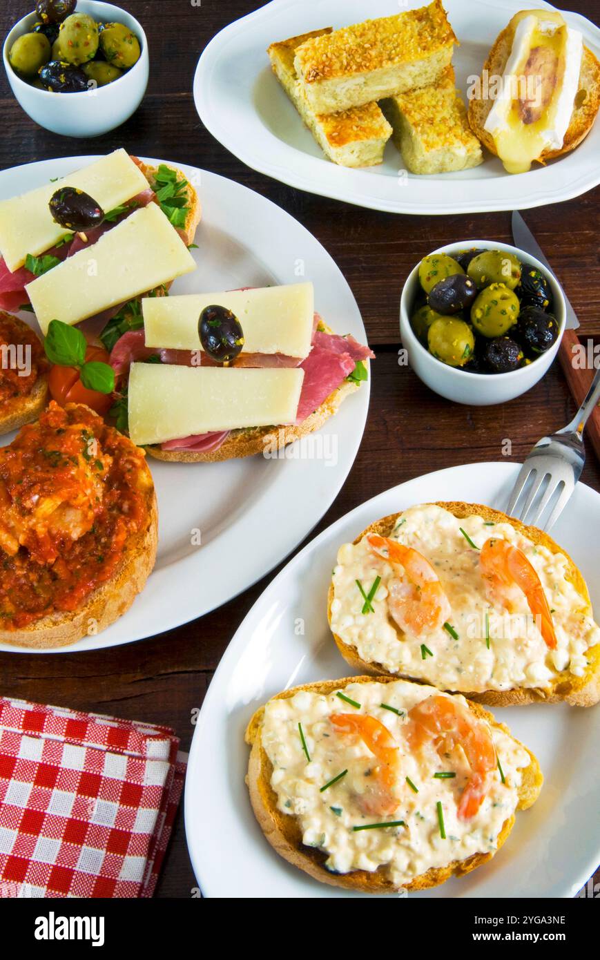 Tapas cheese and prawns, cod and tomato, ham and cheese, potato pie ...