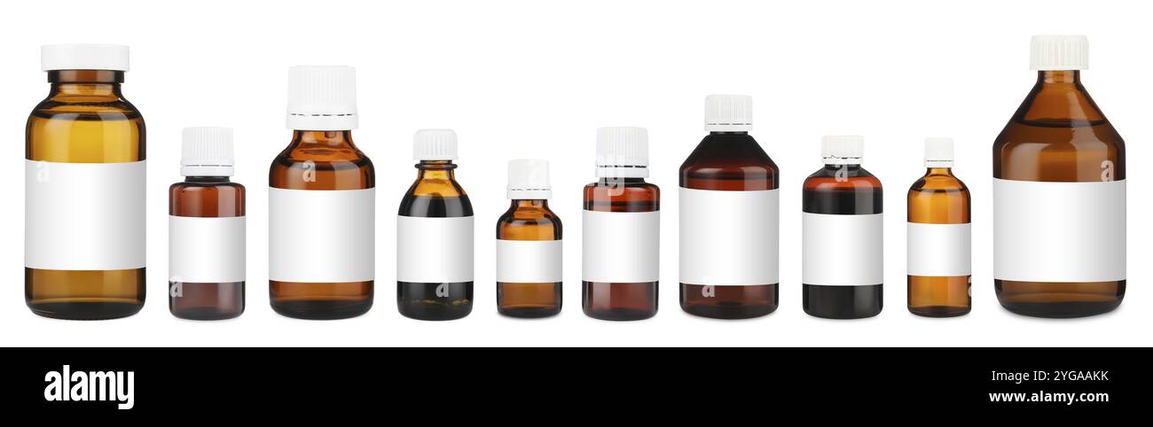 Many different glass bottles with labels isolated on white Stock Photo ...