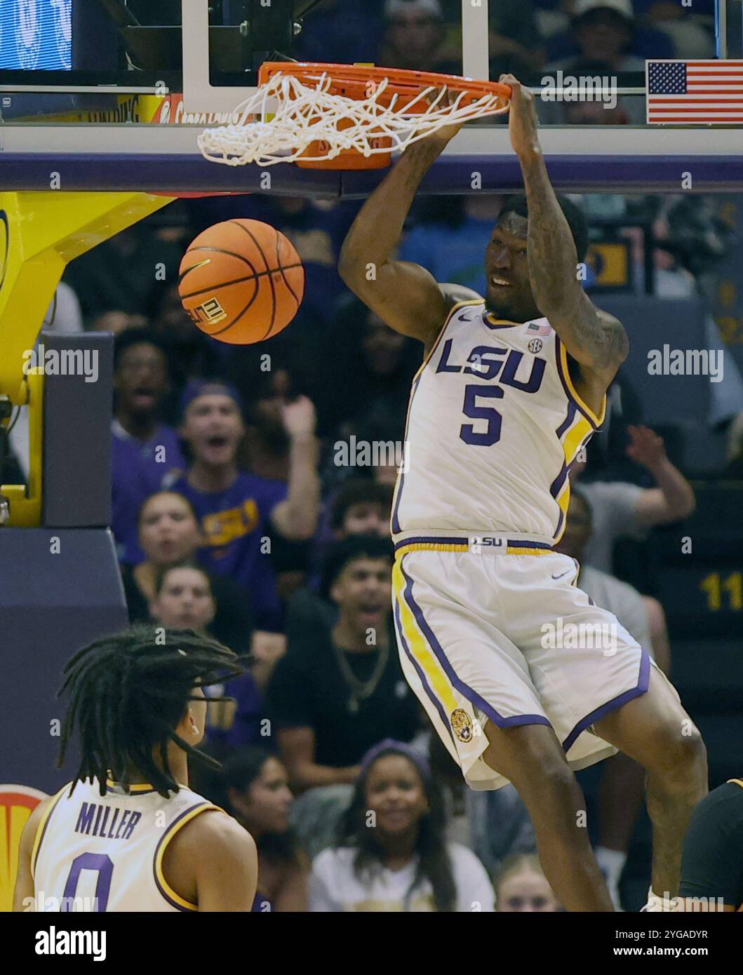 LSU Tigers guard Cam Carter (5) throws down a dunk during a men’s ...