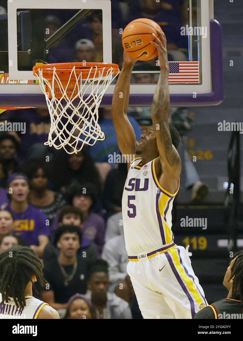 LSU Tigers guard Cam Carter (5) throws down a dunk during a men’s ...