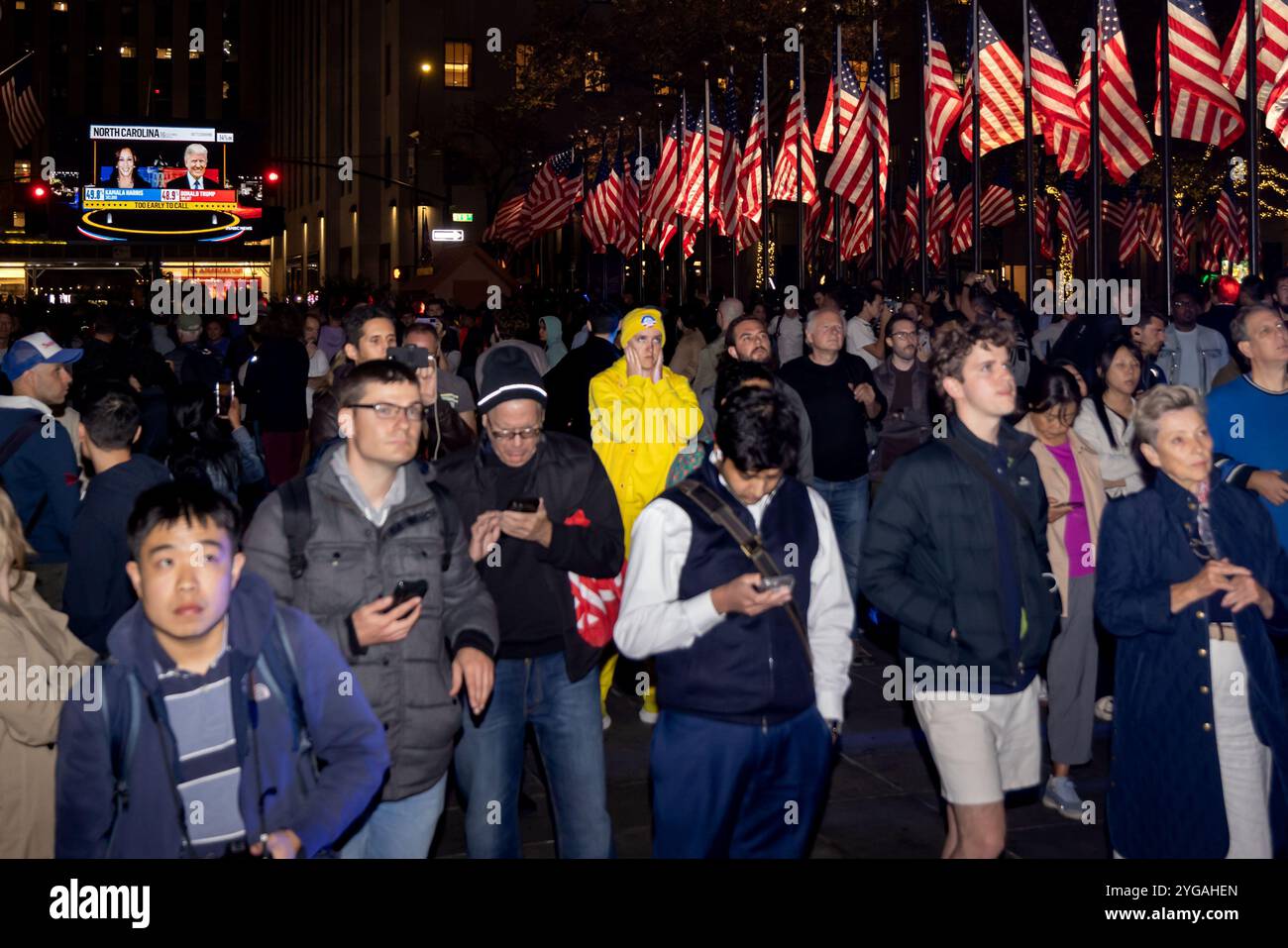 Onlookers watch as the 2024 U.S. Presidential election results are ...