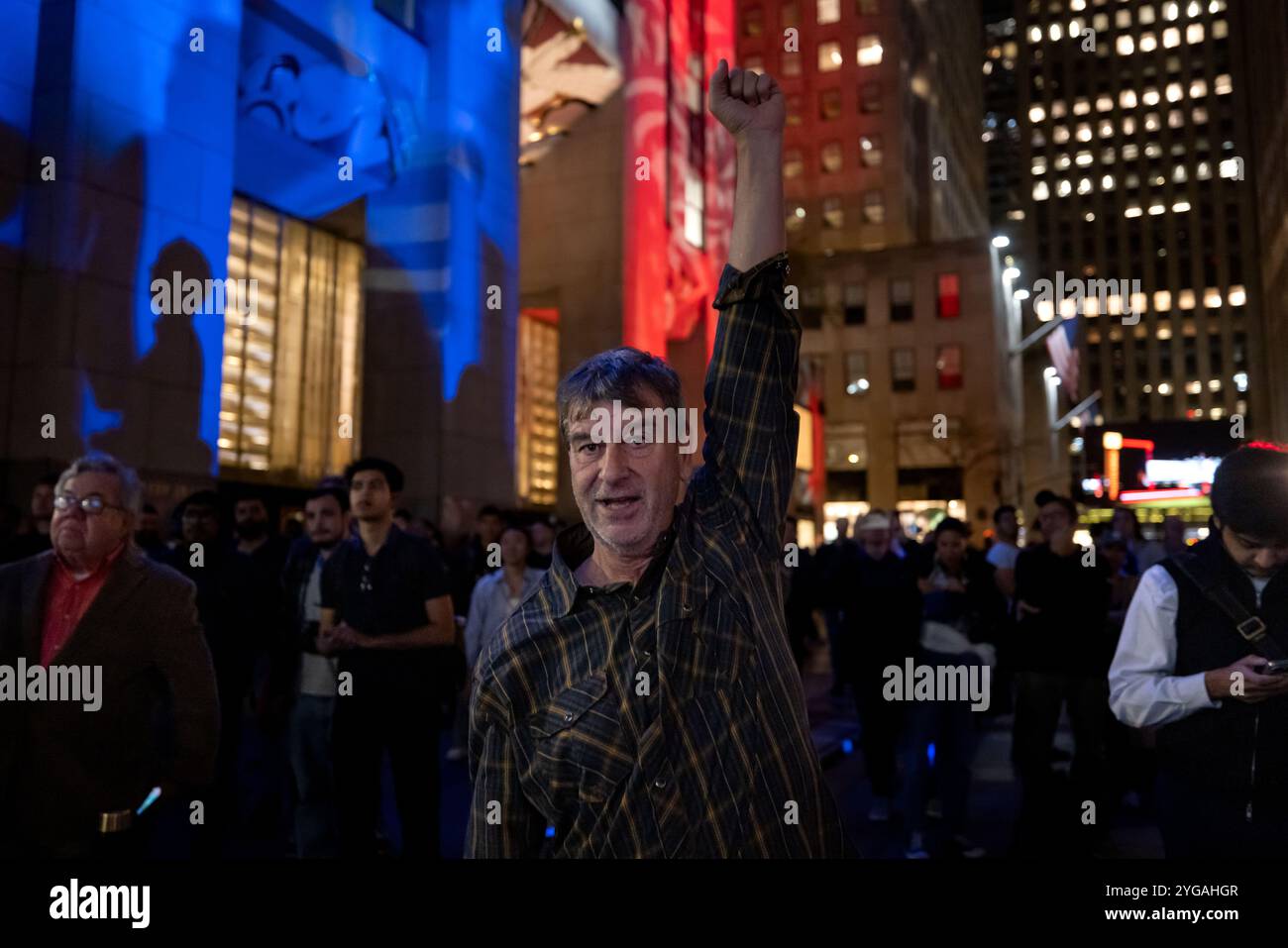 Onlookers watch as the 2024 U.S. Presidential election results are ...
