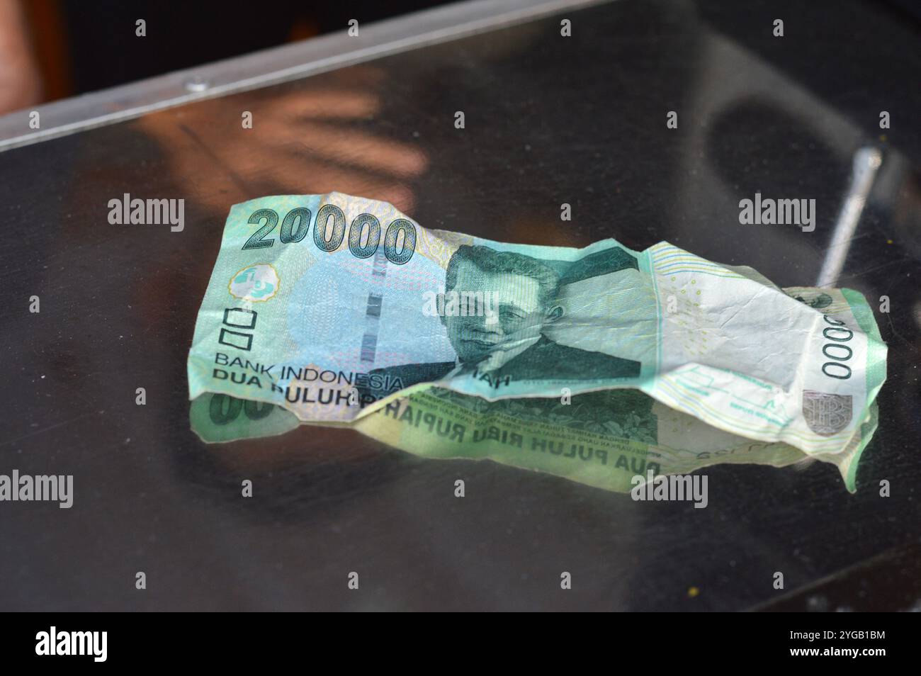 Indonesian banknotes with twenty thousand denominations on the table ...
