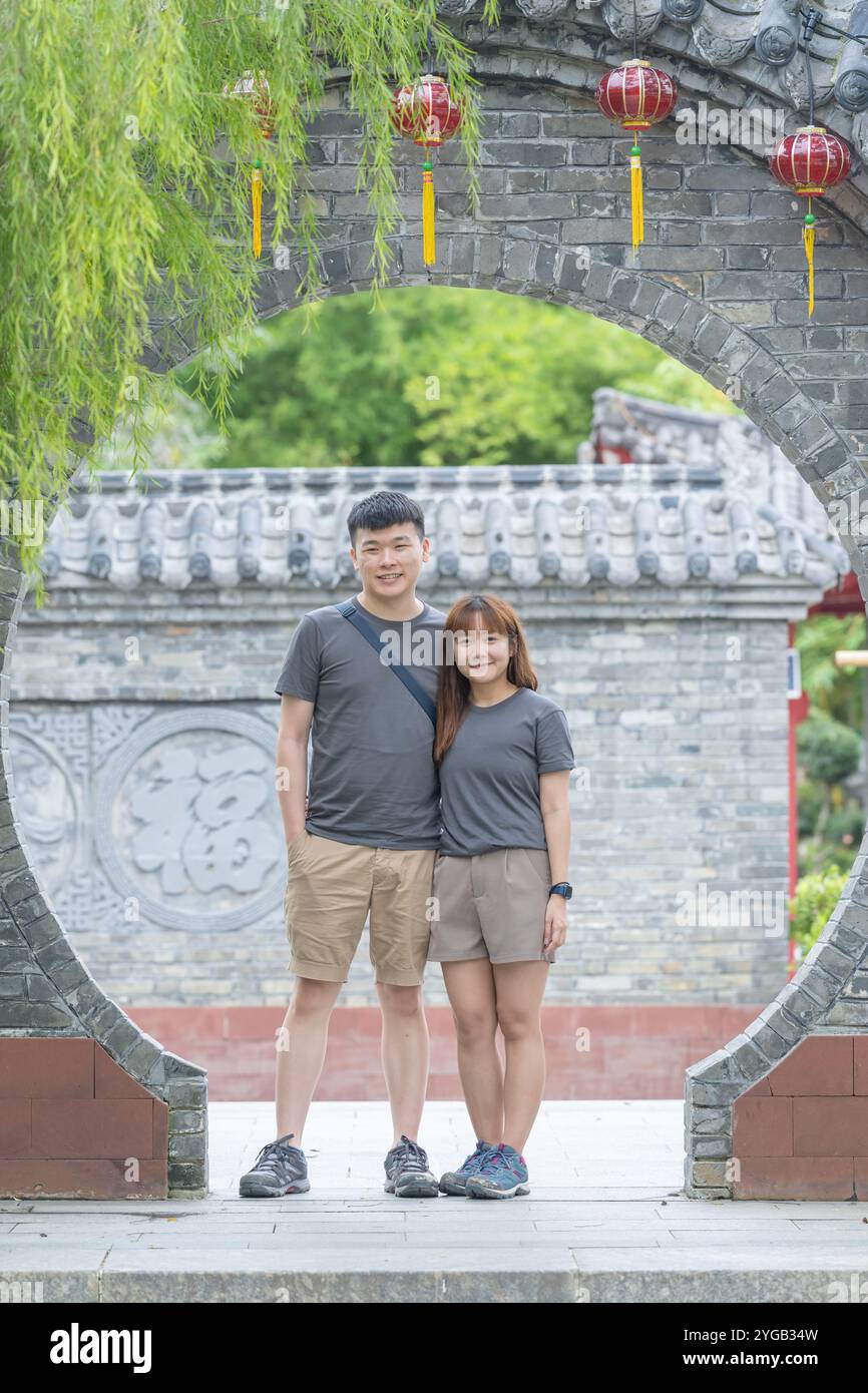 Chinese Malaysian couple in their 30s spending time in Chinese-style ...