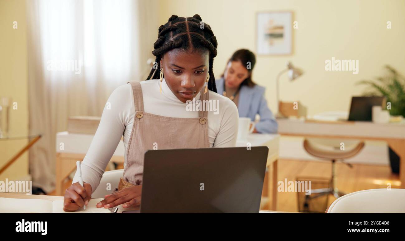 Writing, business woman and laptop with notes in coworking office with ...