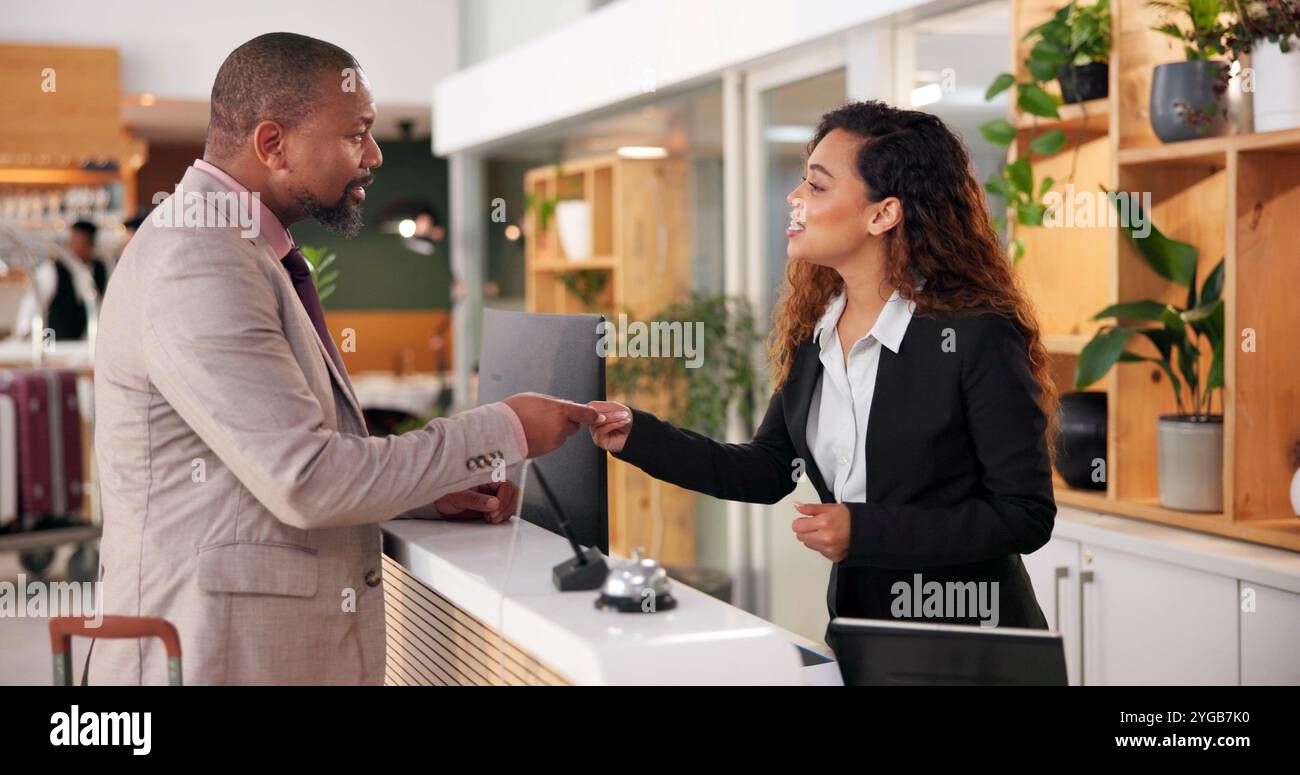 Hotel, lobby and man with key card for booking, guest room service and ...