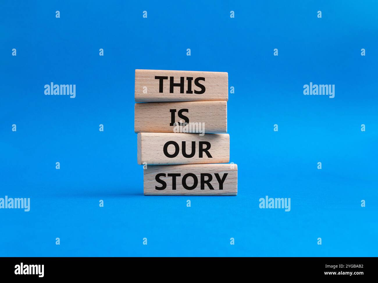 This is our Story symbol. Wooden blocks with words This is our Story ...