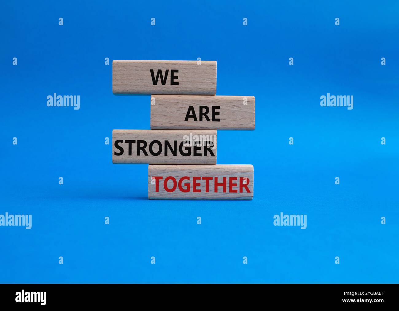 We are stronger together symbol. Wooden blocks with words We are ...