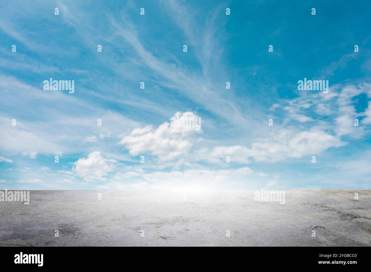 Wide empty grunge cement counter table top on blue sky clouds white ...