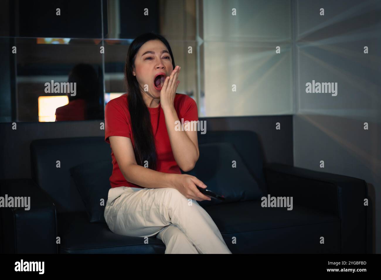 Woman watching movie on television hi-res stock photography and images ...