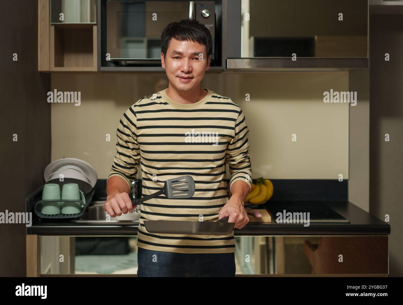 happy man in the kitchen room Stock Photo - Alamy