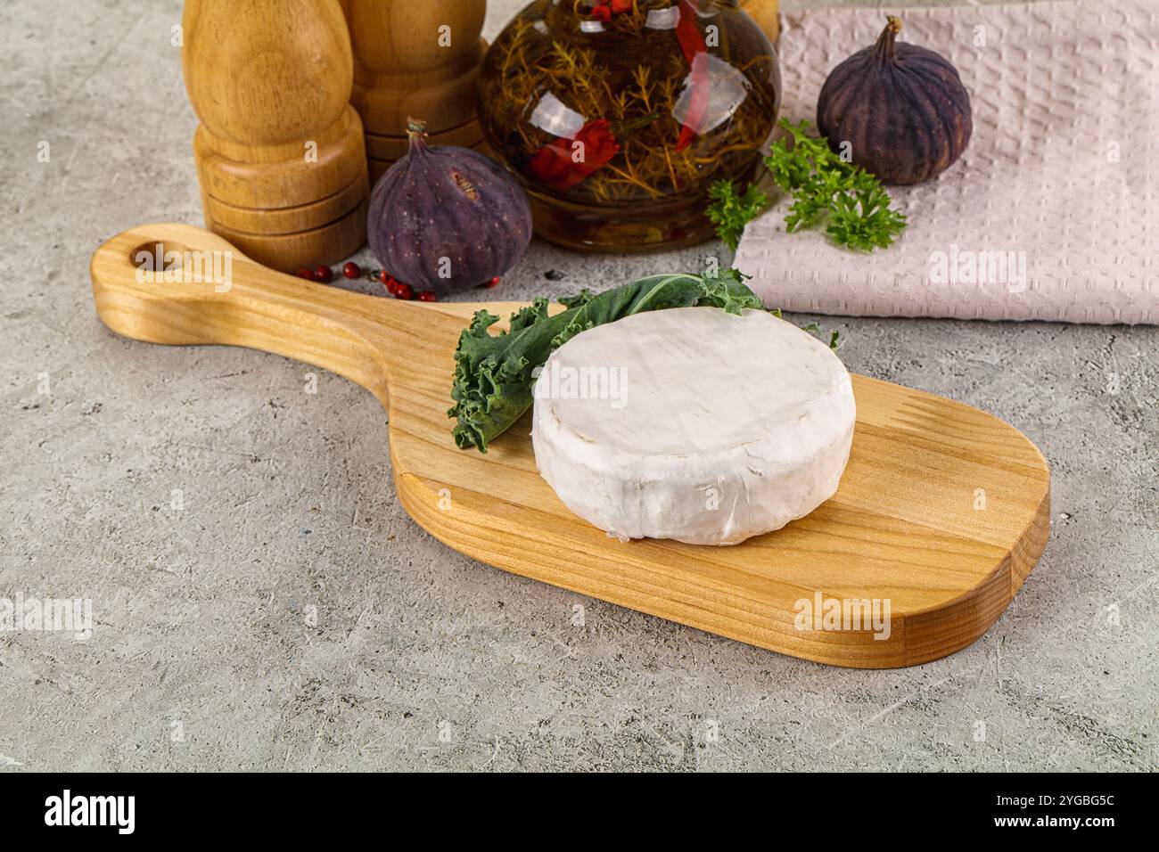 Gourmet round creamy Camembert cheese served fig Stock Photo - Alamy
