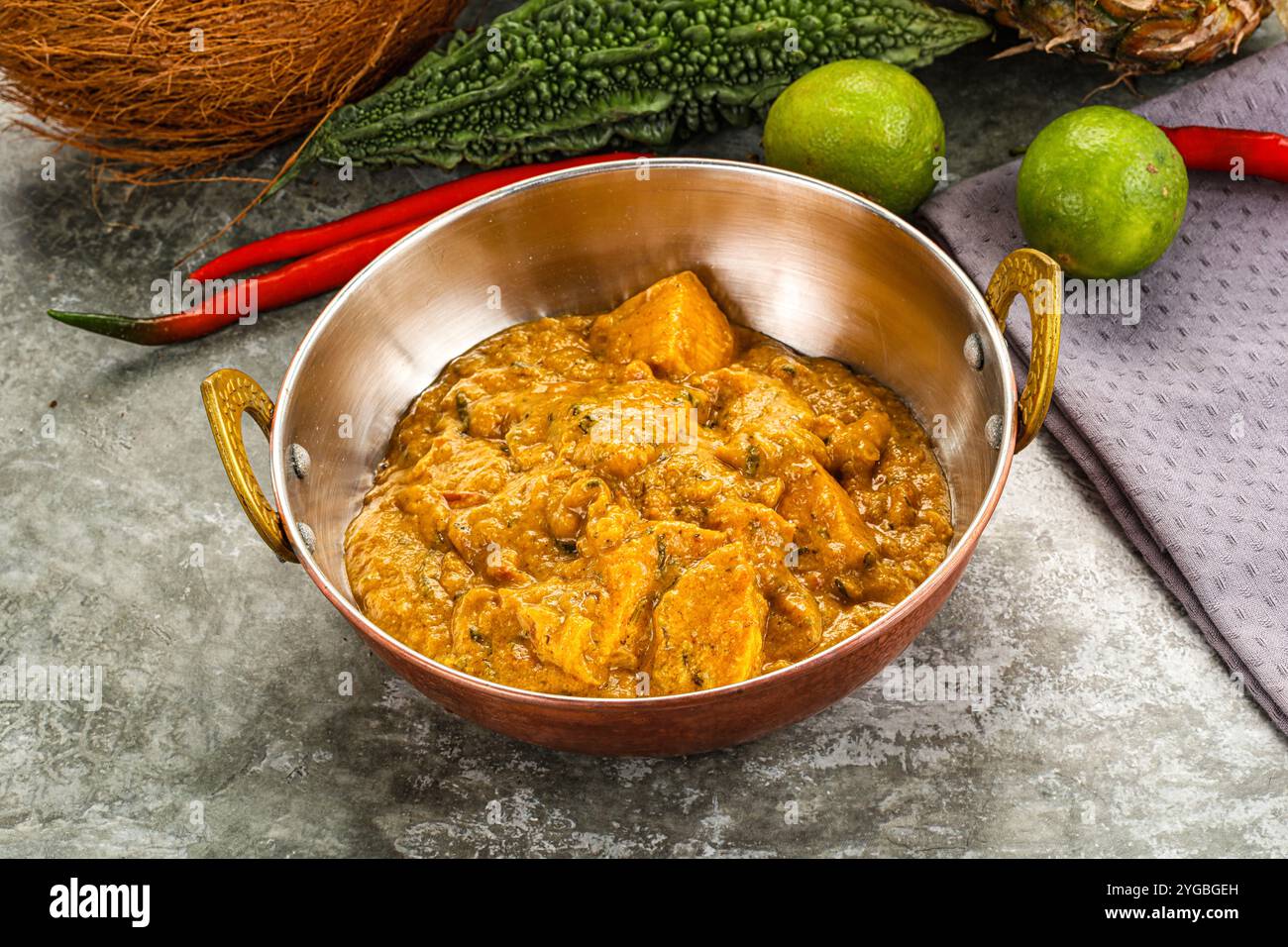 Indian cuisne - Chicken massala with sauce and spices Stock Photo - Alamy