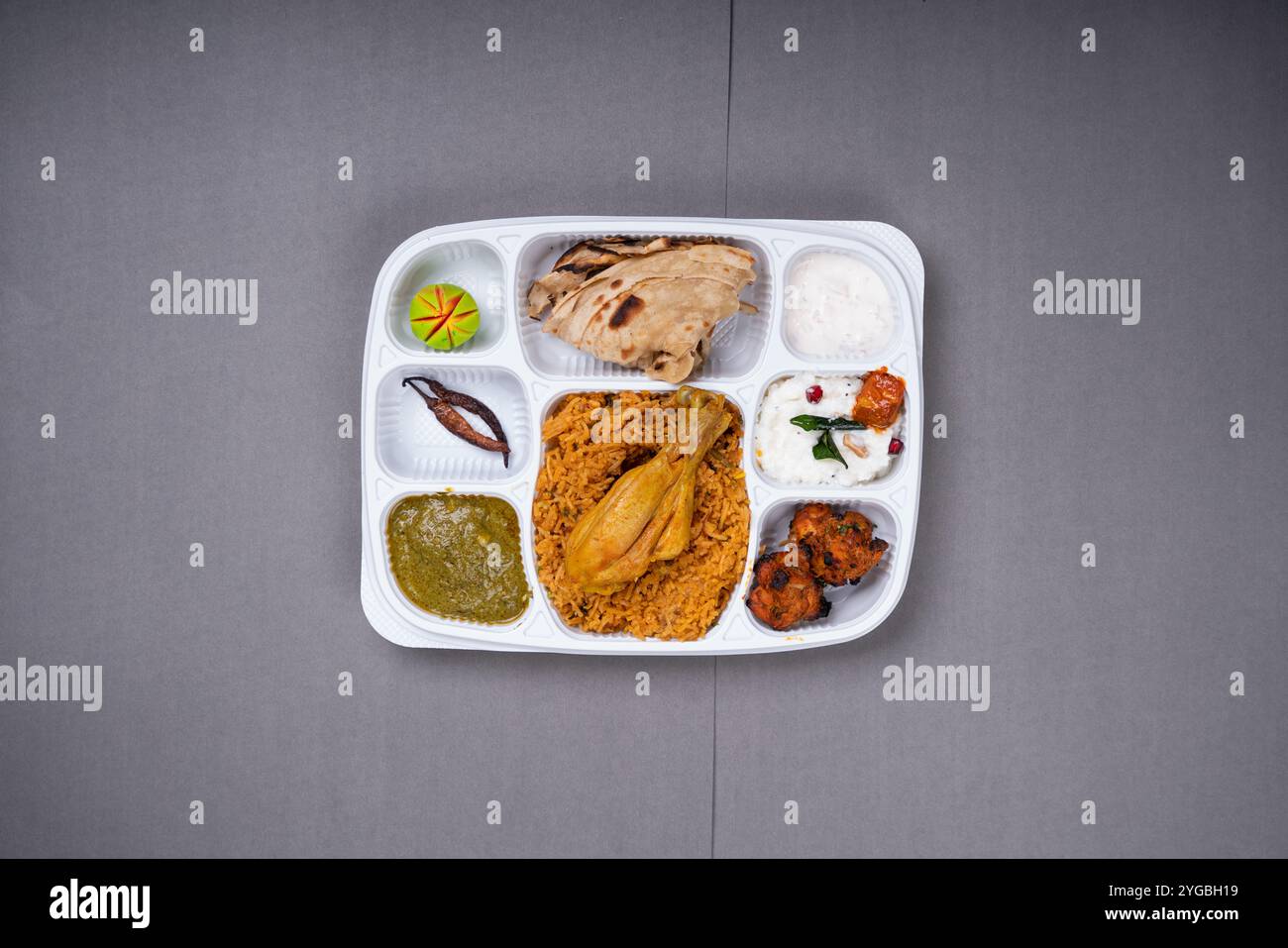 North indian biriyani thali with sweet Stock Photo - Alamy