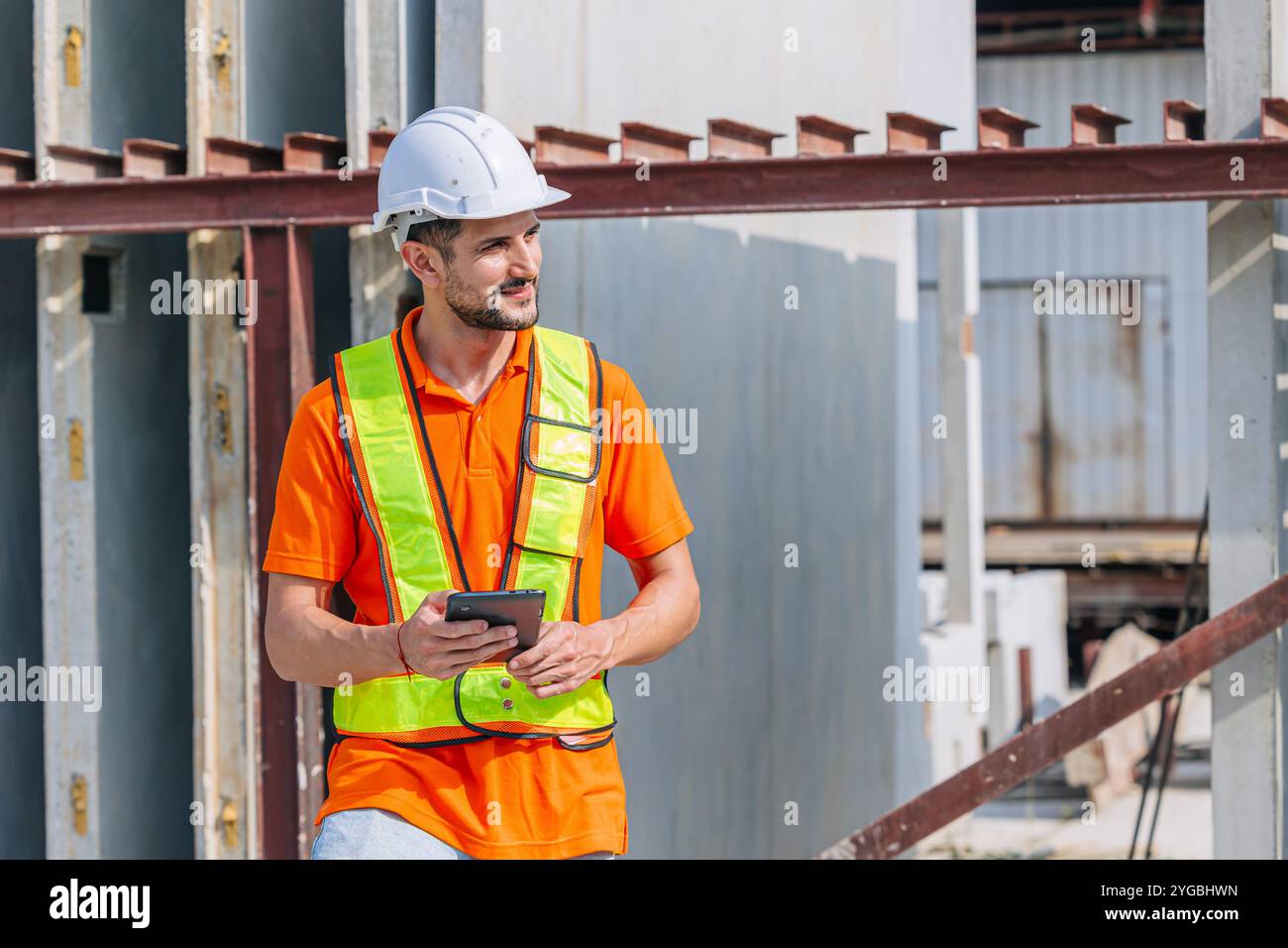 Professional engineer Hispanic Latin male working in concrete precast ...
