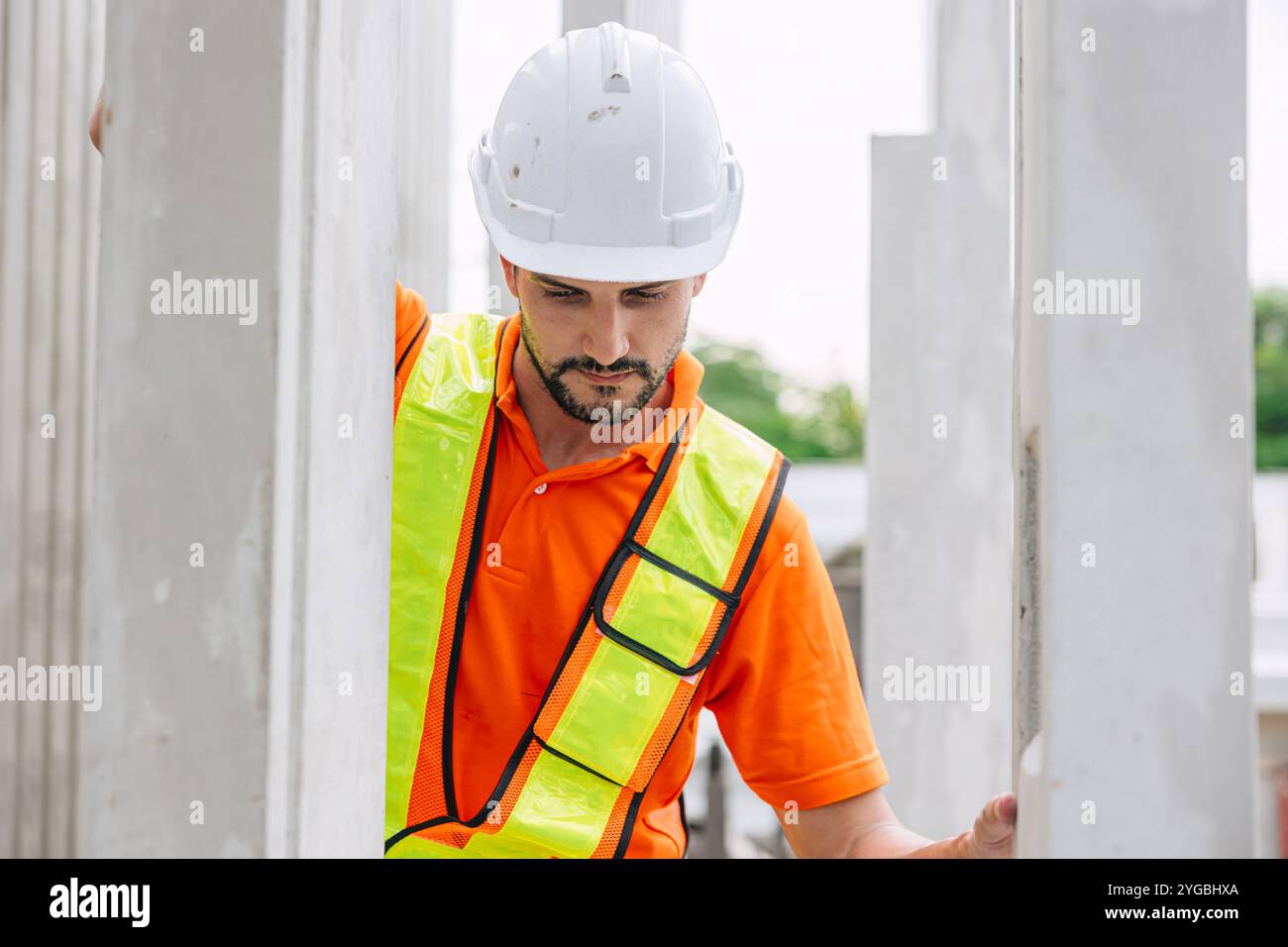 Professional engineer Hispanic Latin male working in concrete precast ...